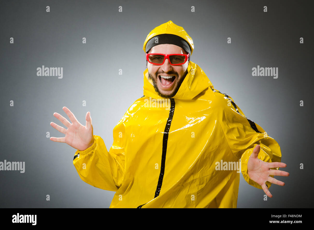 Funny man wearing yellow suit Stock Photo - Alamy