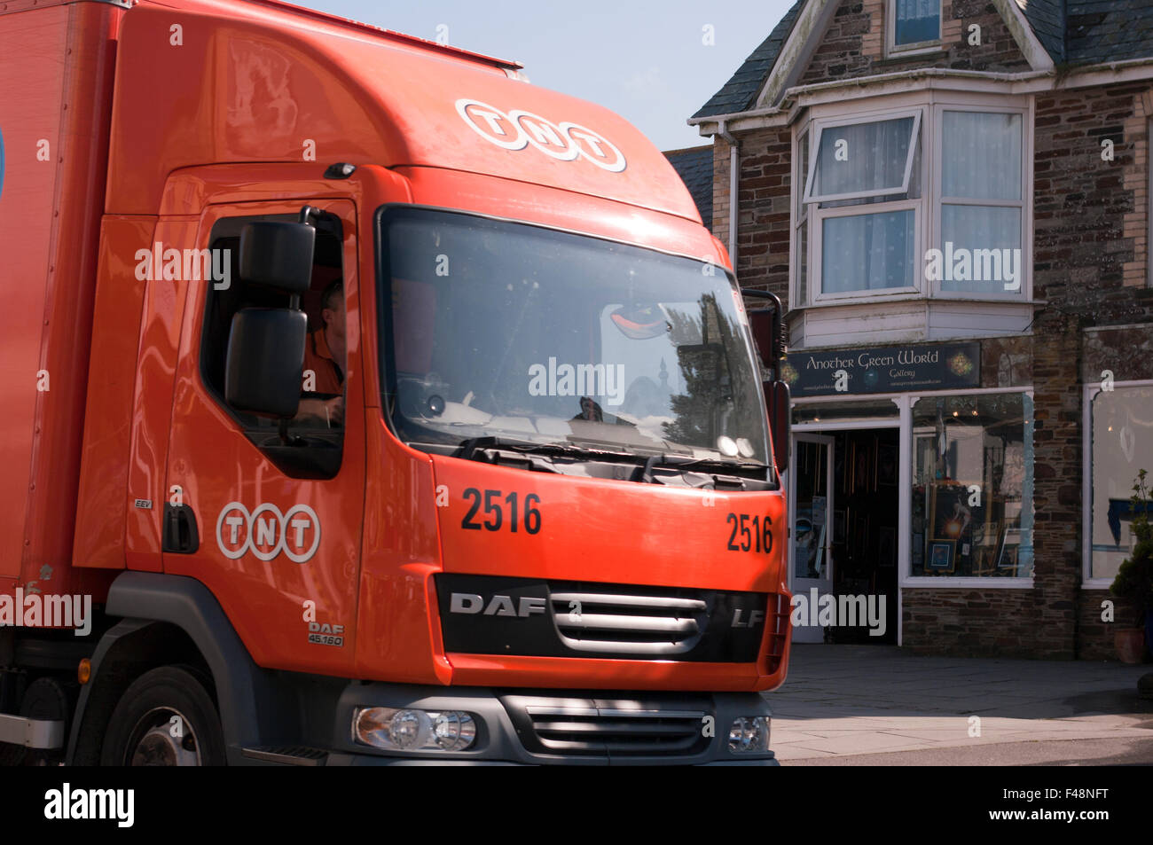 Orange TNT Delivery Lorry Stock Photo - Alamy