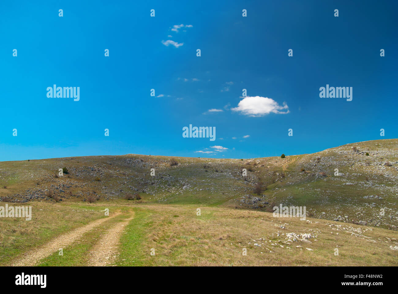 Road over hills Stock Photo - Alamy