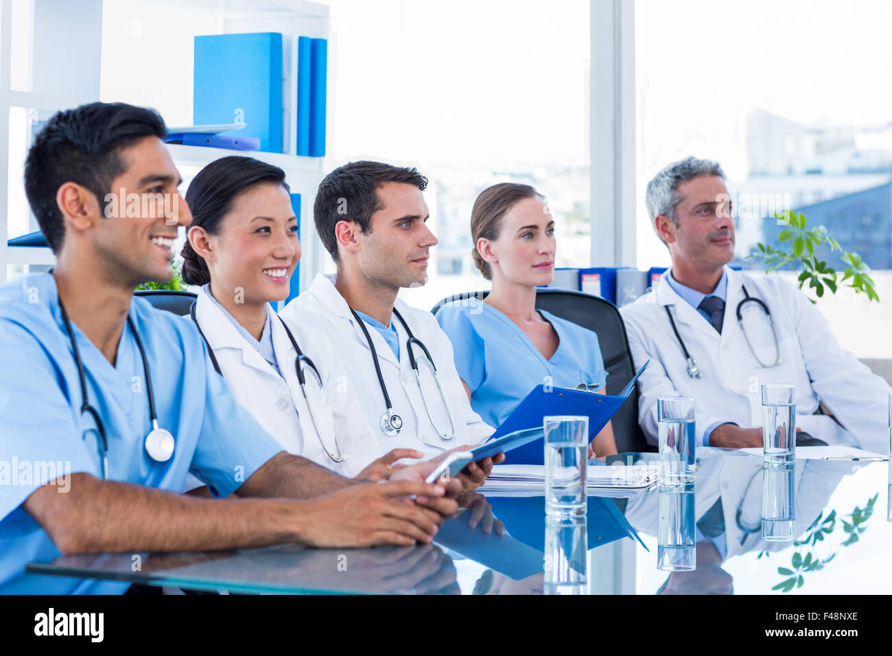 Doctors conference table hi-res stock photography and images - Alamy