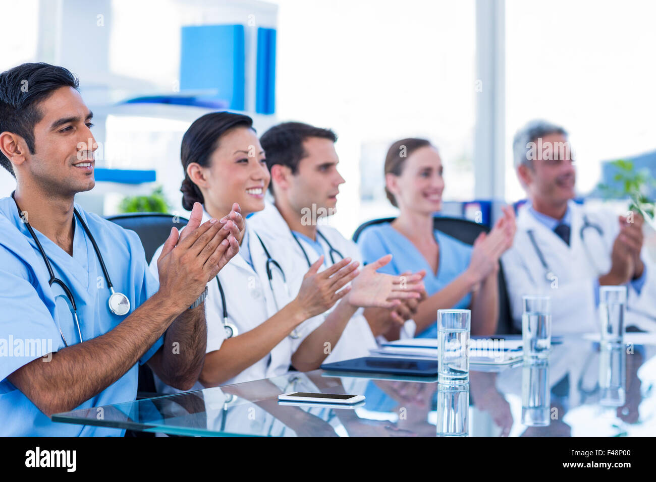Doctors conference table hi-res stock photography and images - Alamy