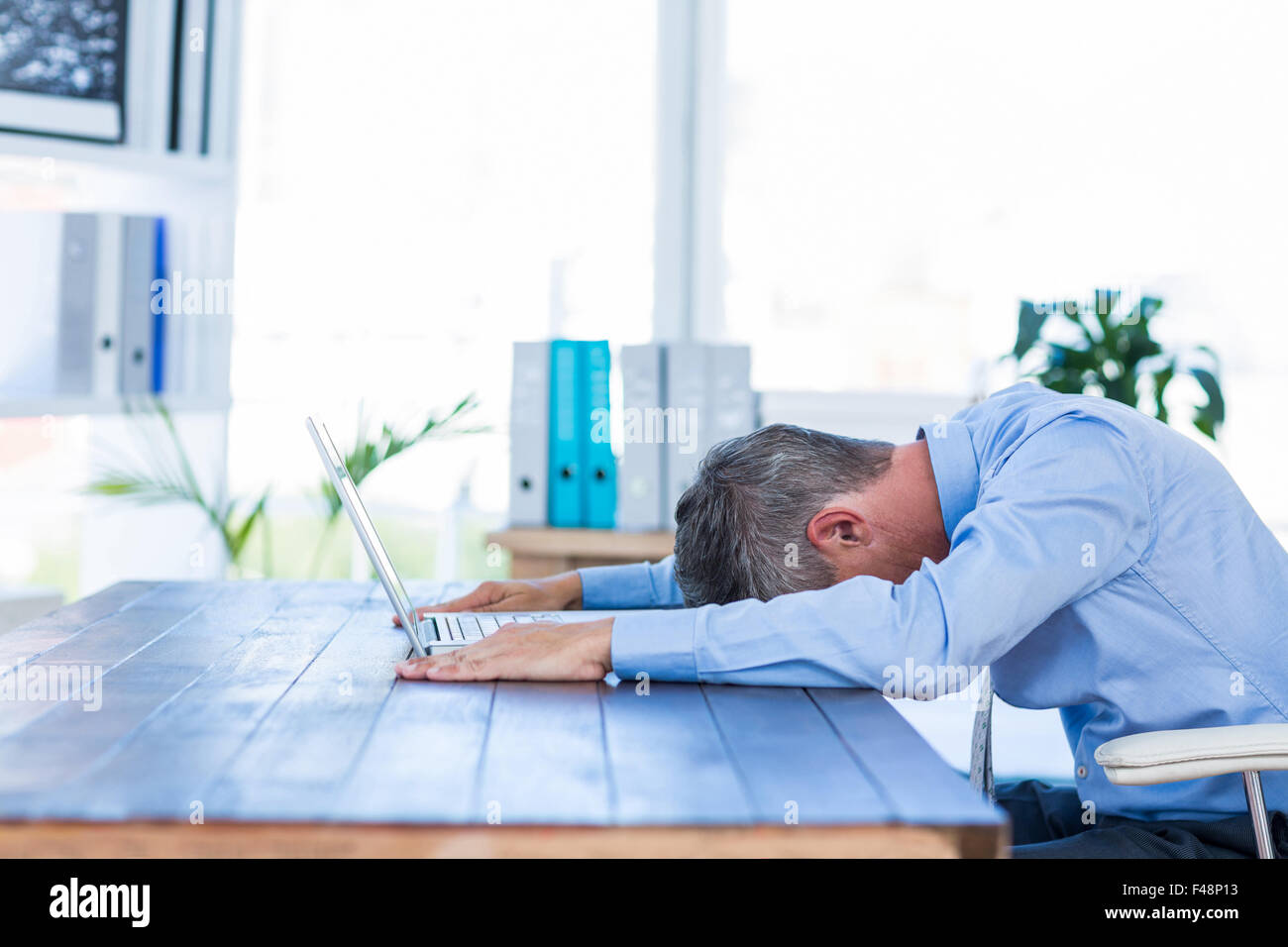 Desk sitting lying on desk hi-res stock photography and images - Alamy