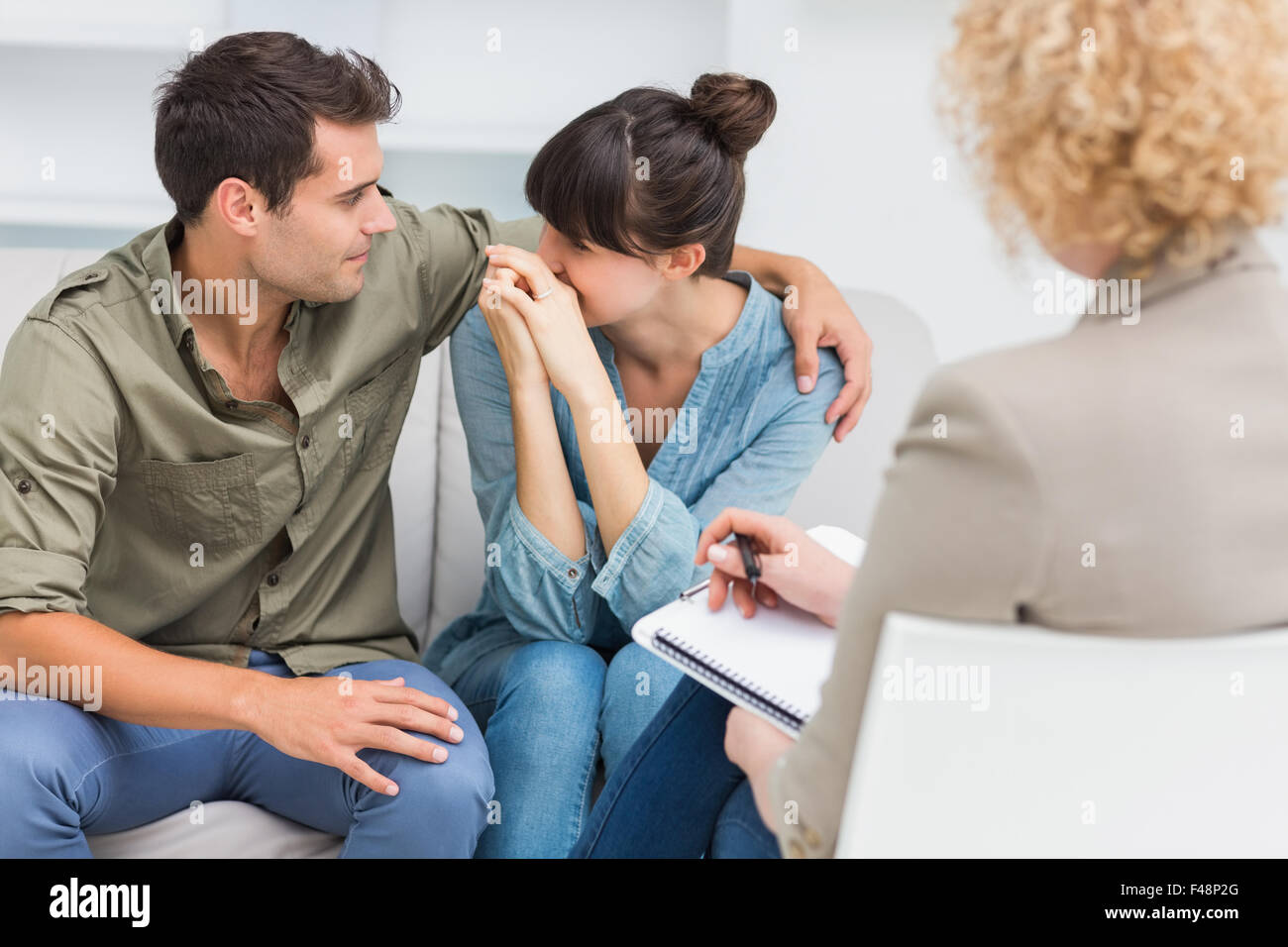 Psychologist helping a couple with relationship difficulties Stock ...