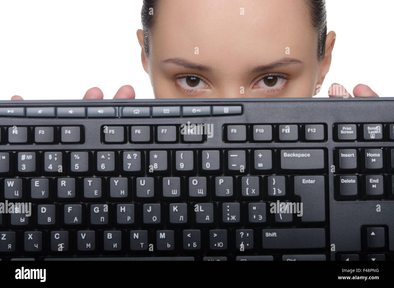 Woman holding a keyboard Stock Photo - Alamy