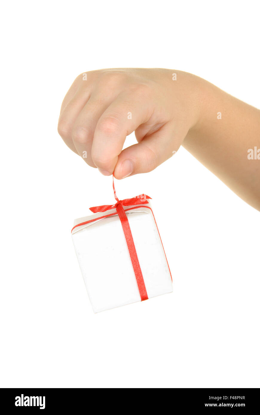 Hand holds box with gift Stock Photo - Alamy