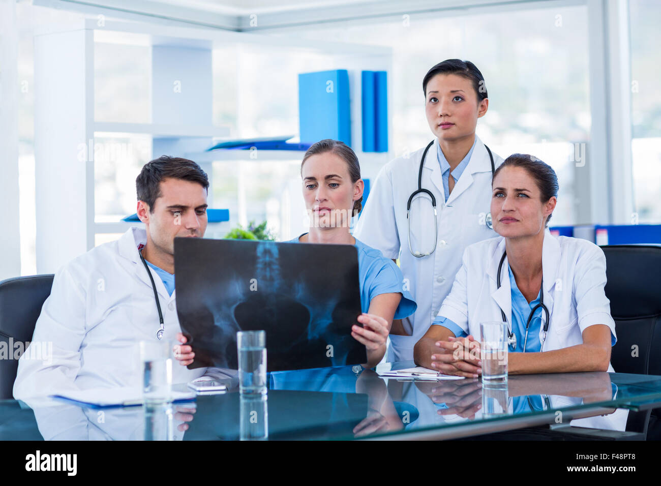 Medical worker looking xray office hi-res stock photography and images ...