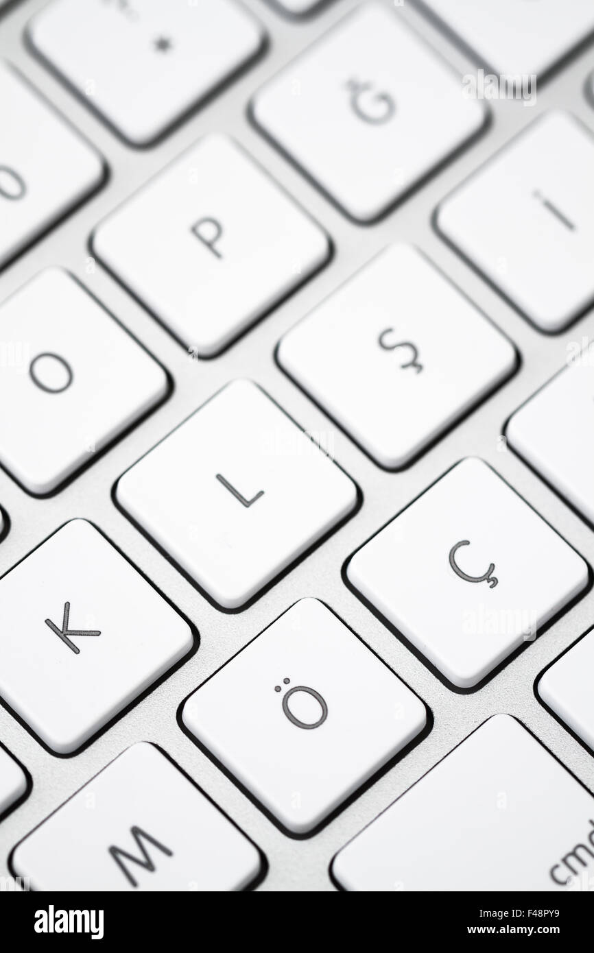 Close up of a modern white, gray computer keyboard with Turkish letters ...
