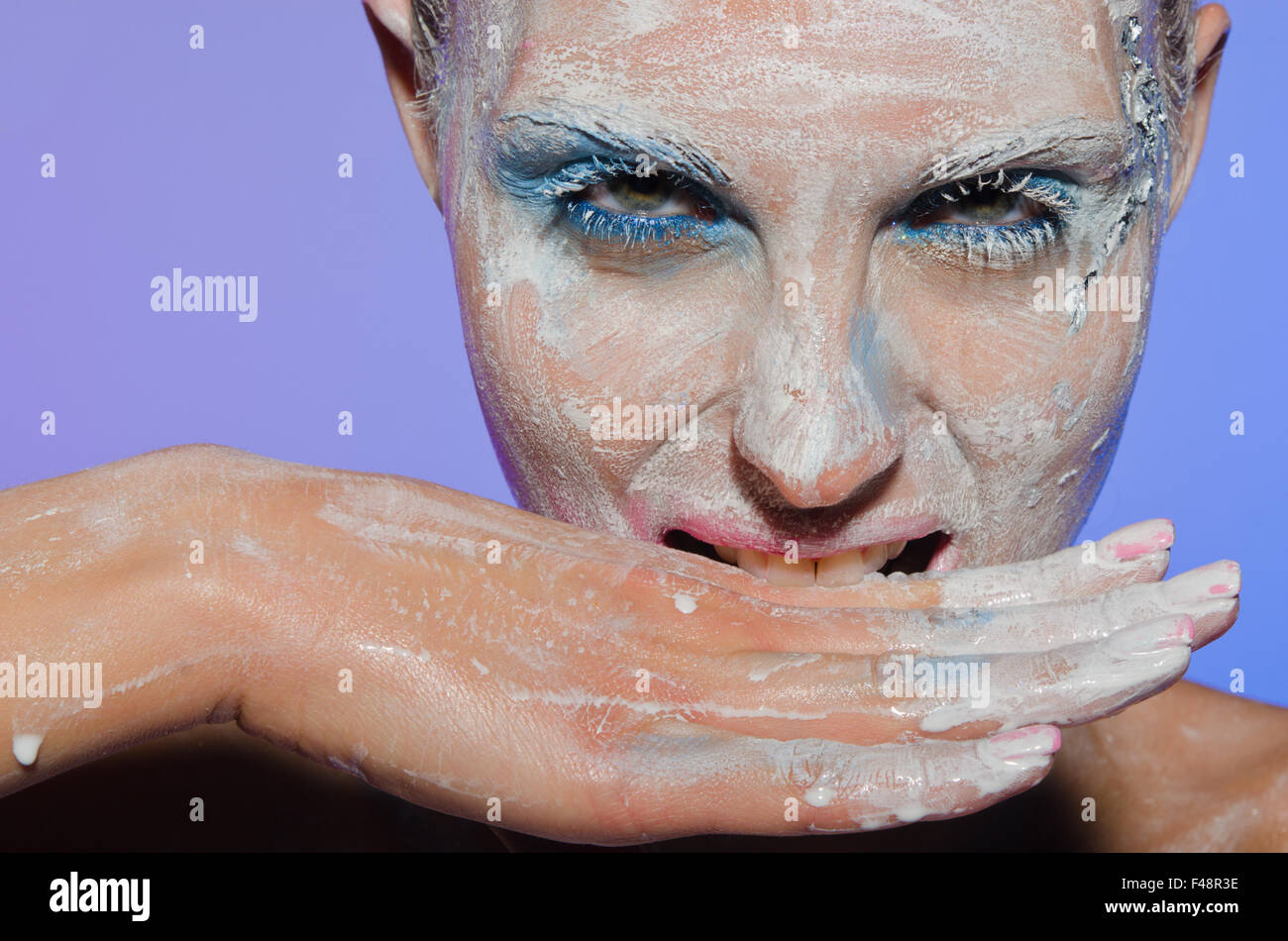 Horizontal portrait of woman with paints Stock Photo - Alamy