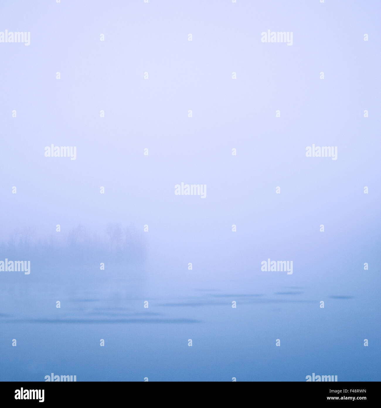 Landscape in fog Stock Photo - Alamy