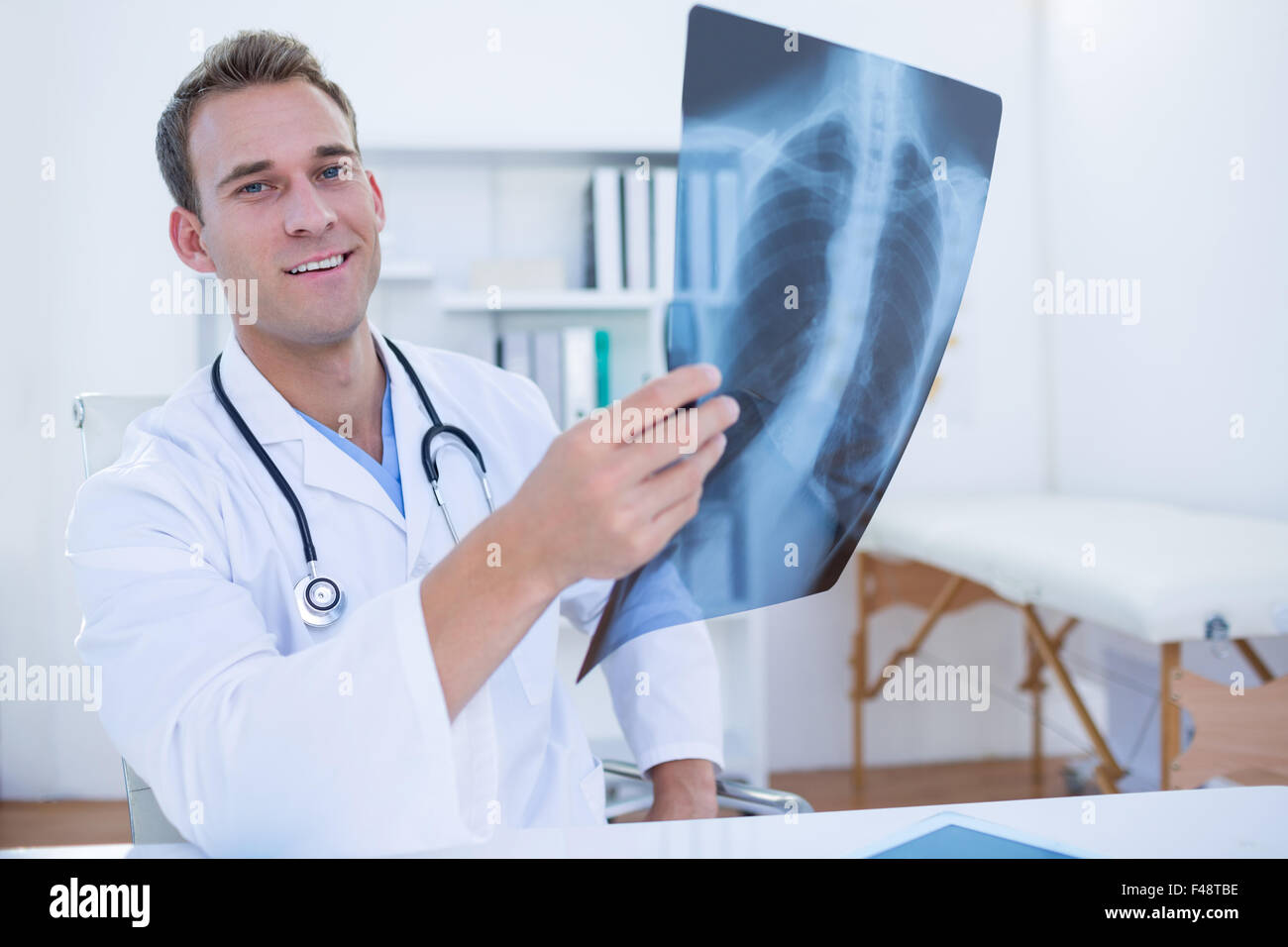 Doctor looking at xray hi-res stock photography and images - Alamy