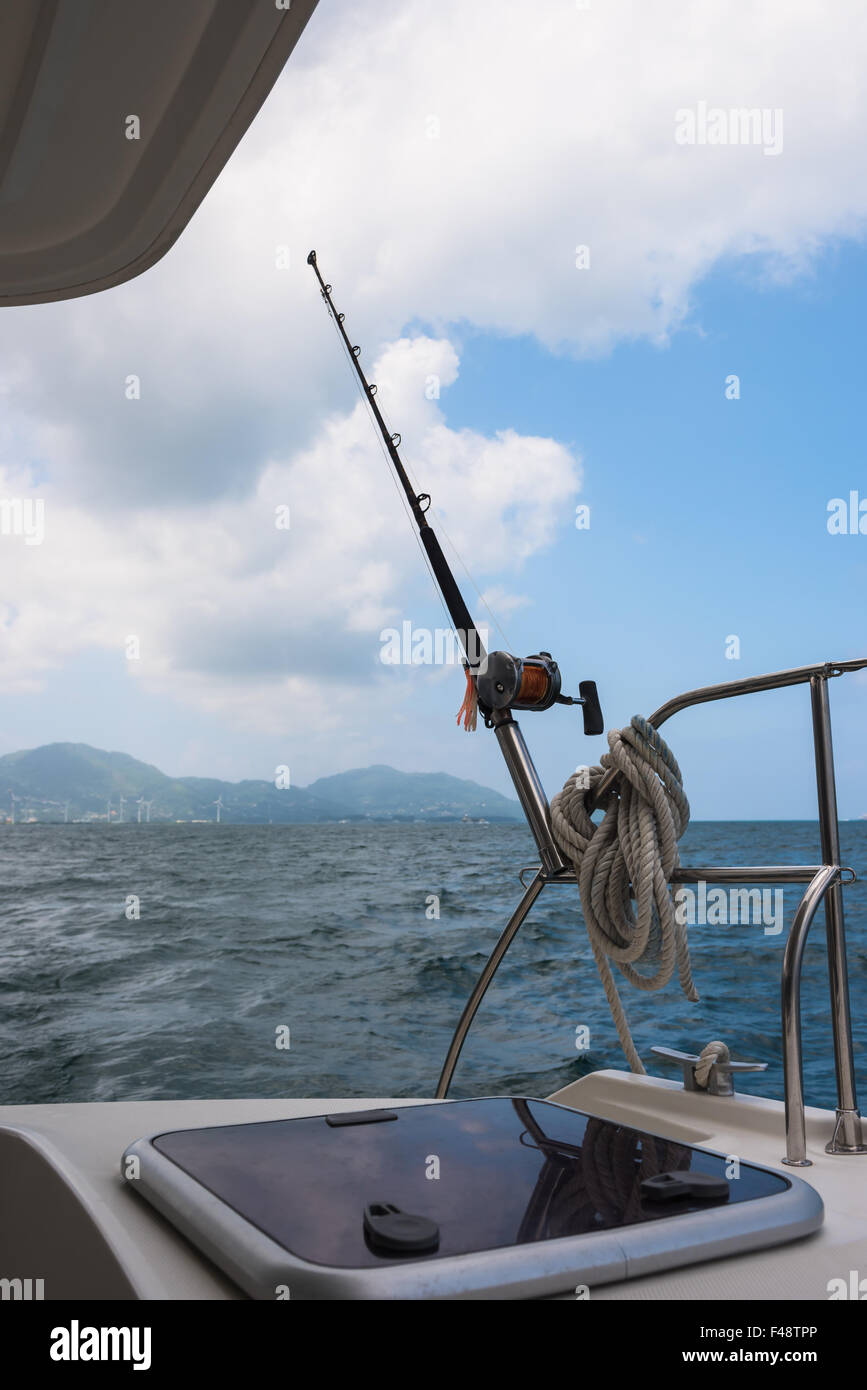 Fishing on a boat. Vertical shot Stock Photo - Alamy