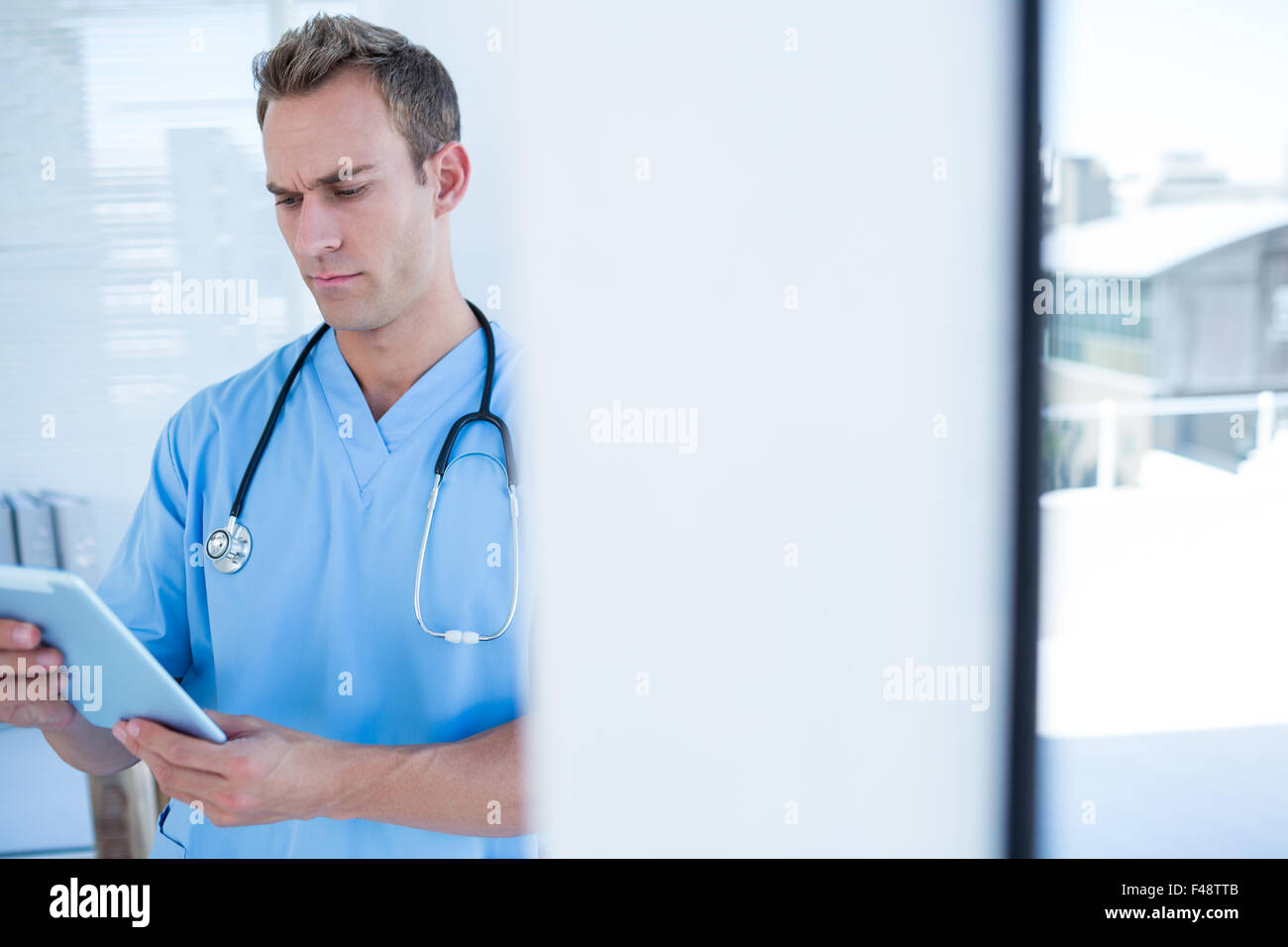 Doctor watching hi-res stock photography and images - Alamy