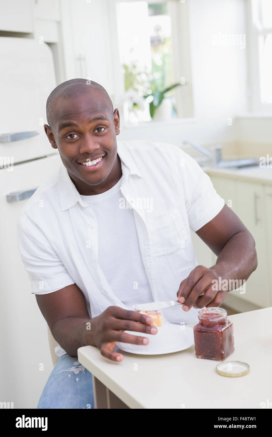 portrait smiling man taking his breakfast Stock Photo - Alamy
