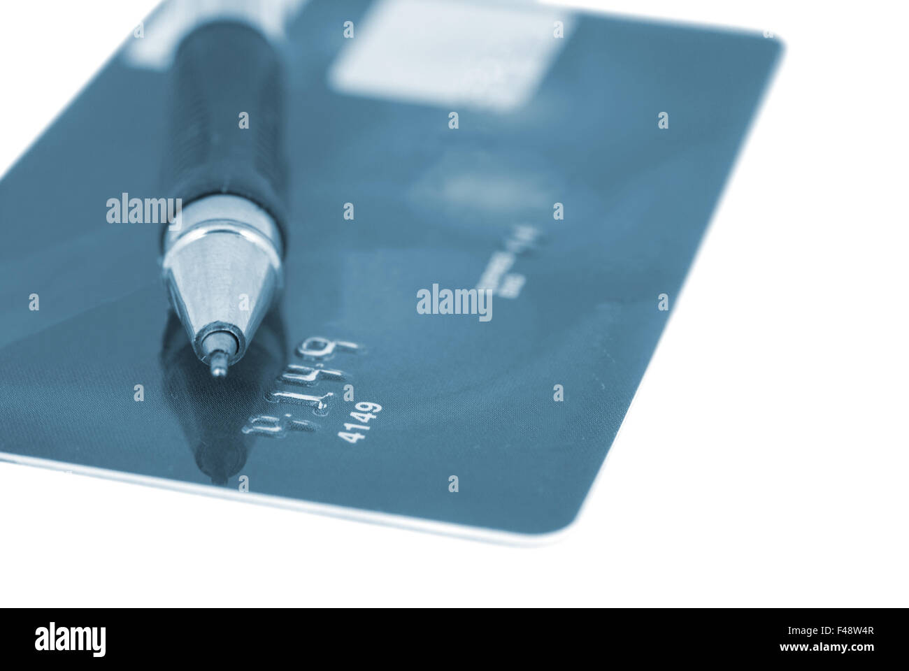 Credit card with pen Stock Photo - Alamy
