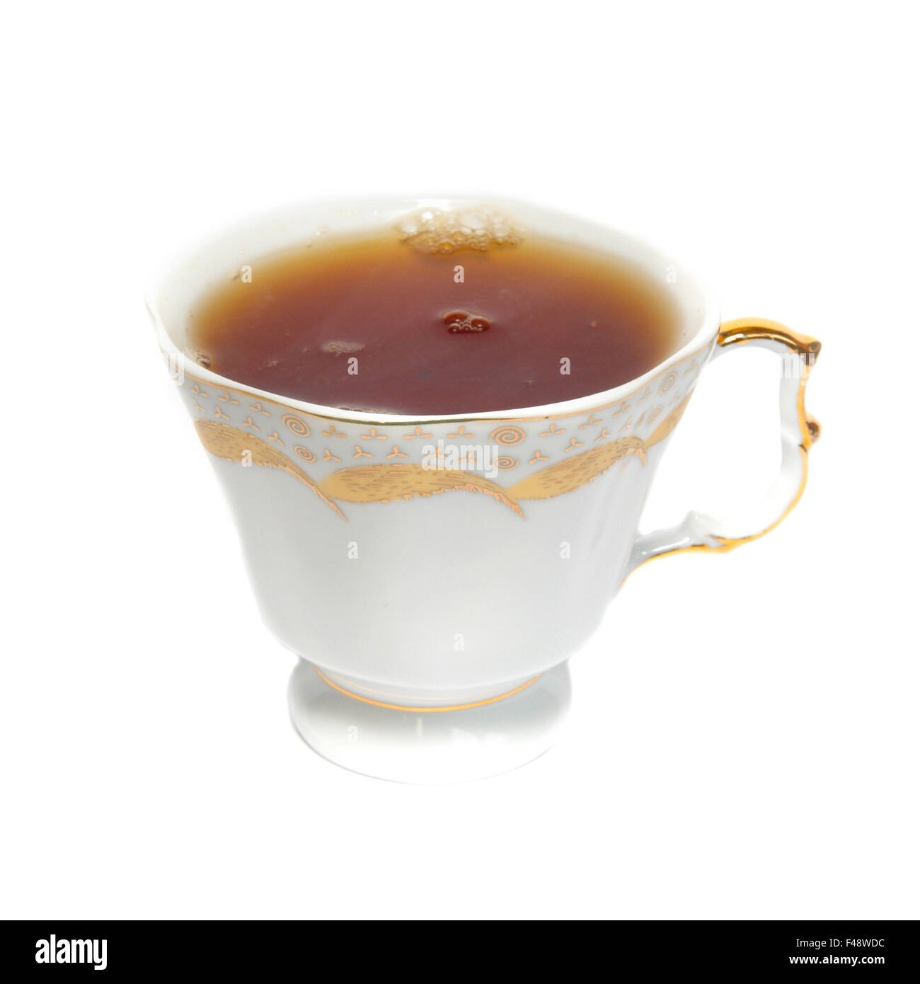 Teacup with tea isolated on white Stock Photo - Alamy