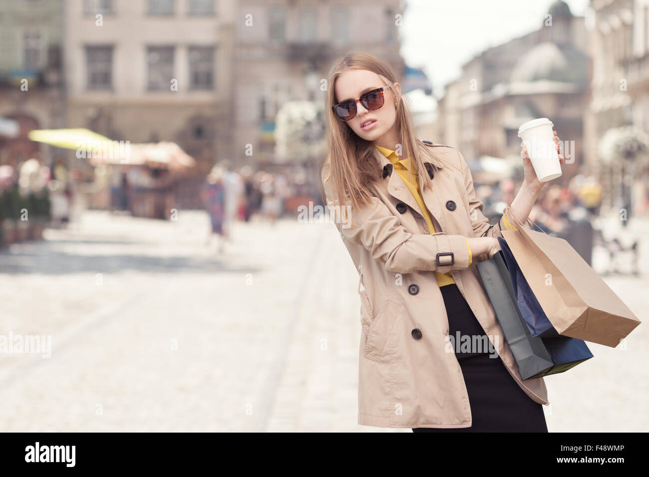 Woman heavy shopping bags hi-res stock photography and images - Alamy