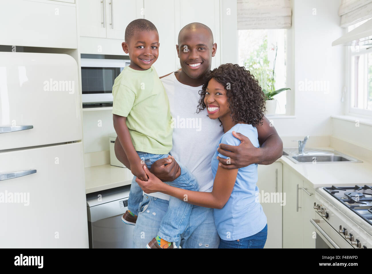 Portrait of a happy smiling family Stock Photo - Alamy