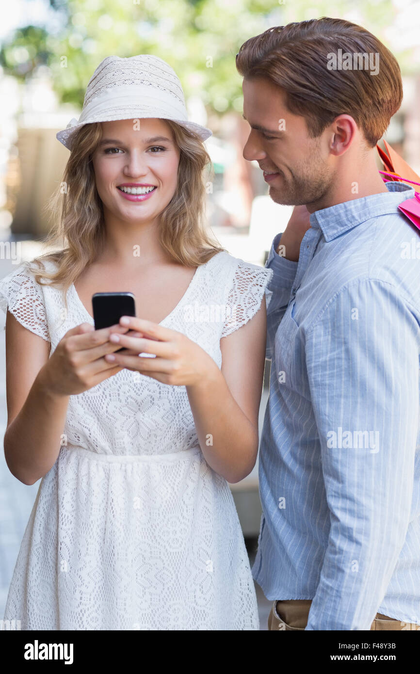 Couple sending message smartphone hi-res stock photography and images ...