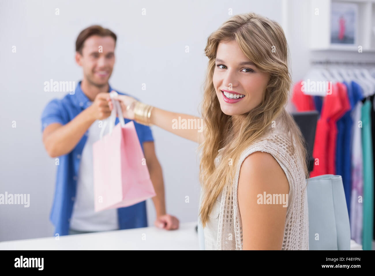 A woman taking a bag Stock Photo - Alamy