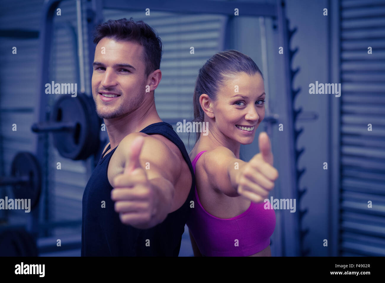 Fit couple thumbs up hi-res stock photography and images - Alamy