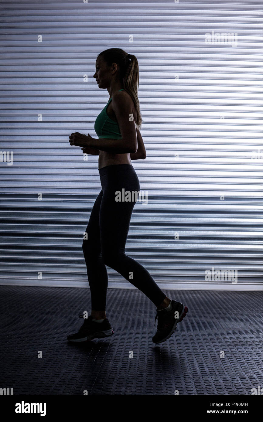 Muscular woman running hi-res stock photography and images - Alamy