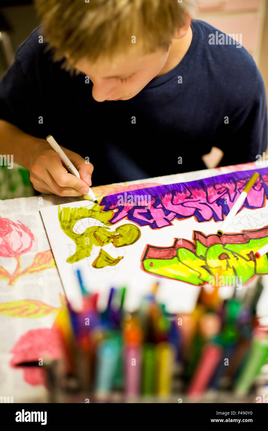 A boy drawing Stock Photo - Alamy