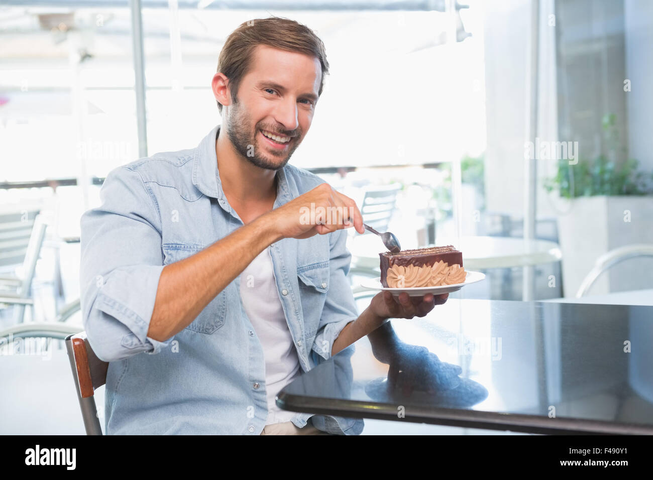 Man eating cake happy hi-res stock photography and images - Alamy