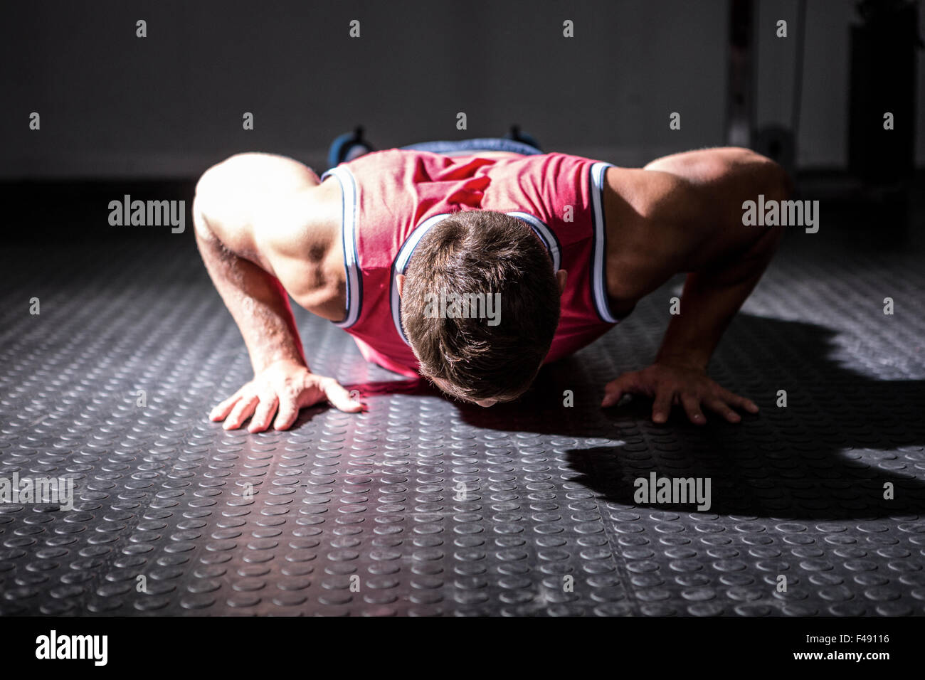 Muscular man doing push-ups Stock Photo - Alamy