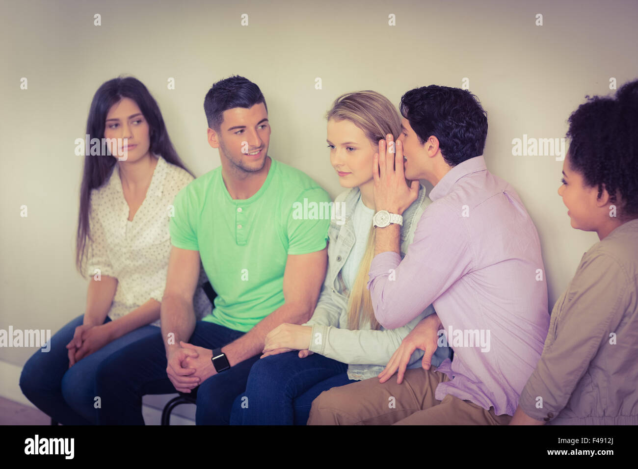 Students gossiping in the hall Stock Photo - Alamy