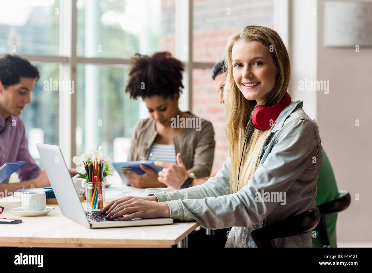 Group of students working on assignments Stock Photo - Alamy