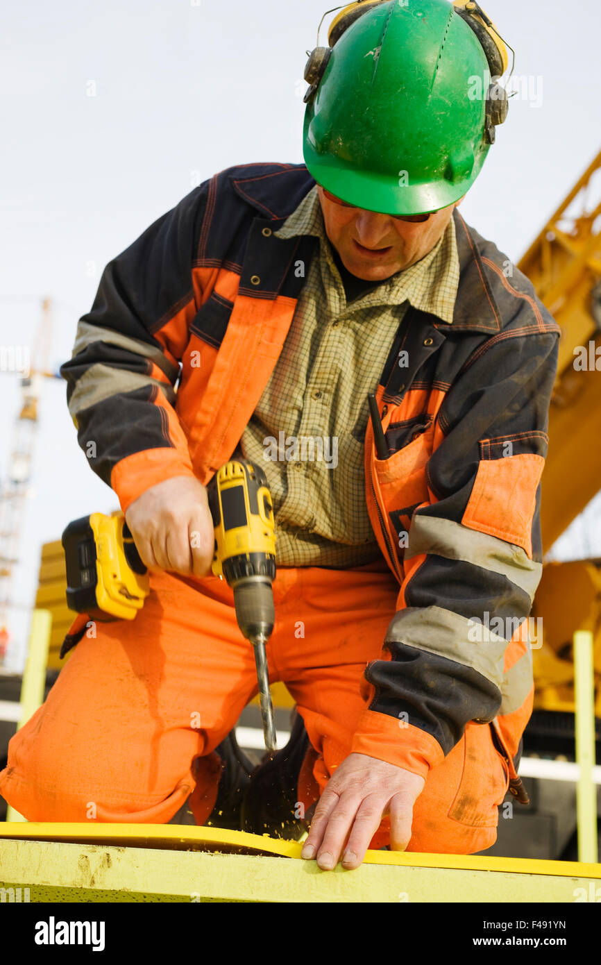 Construction worker on a construction site, Sweden Stock Photo - Alamy