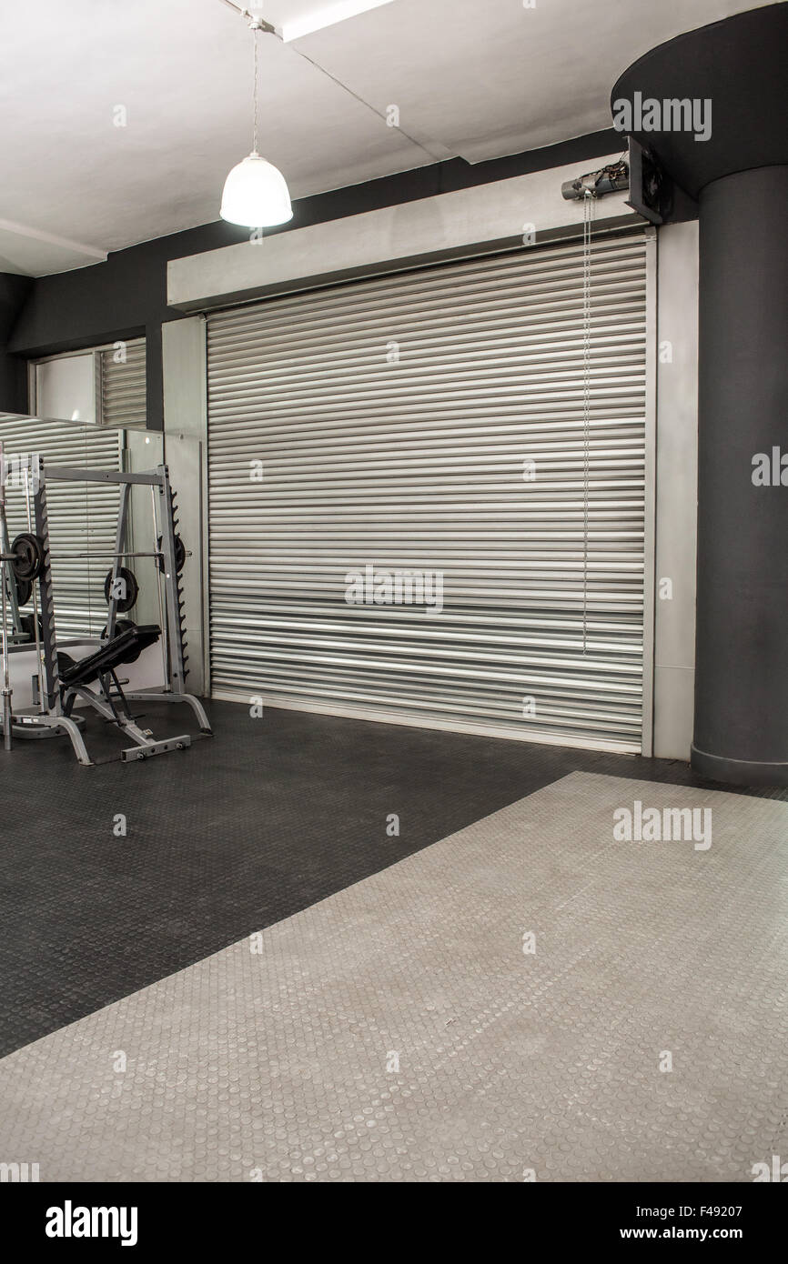 Exercise room with shutters Stock Photo - Alamy