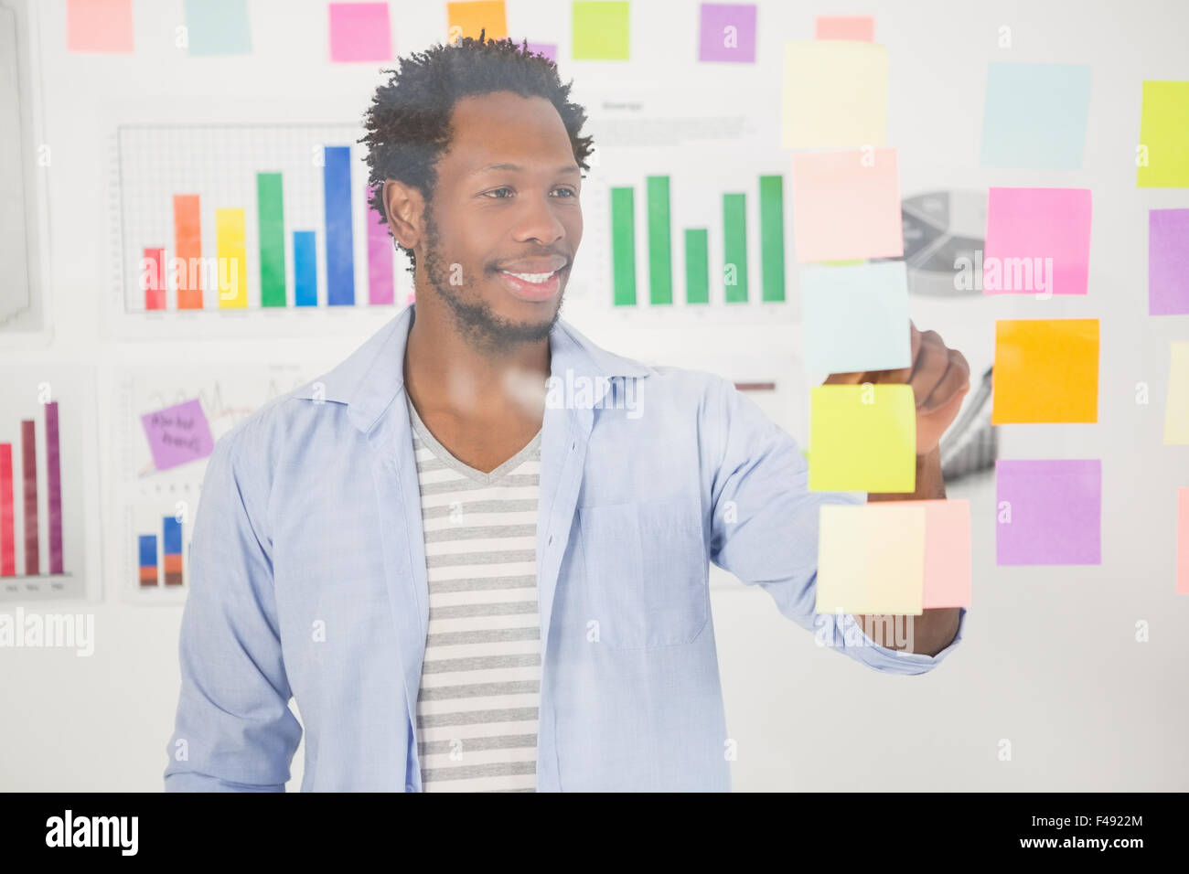 Businessman pointing sticky note hi-res stock photography and images ...