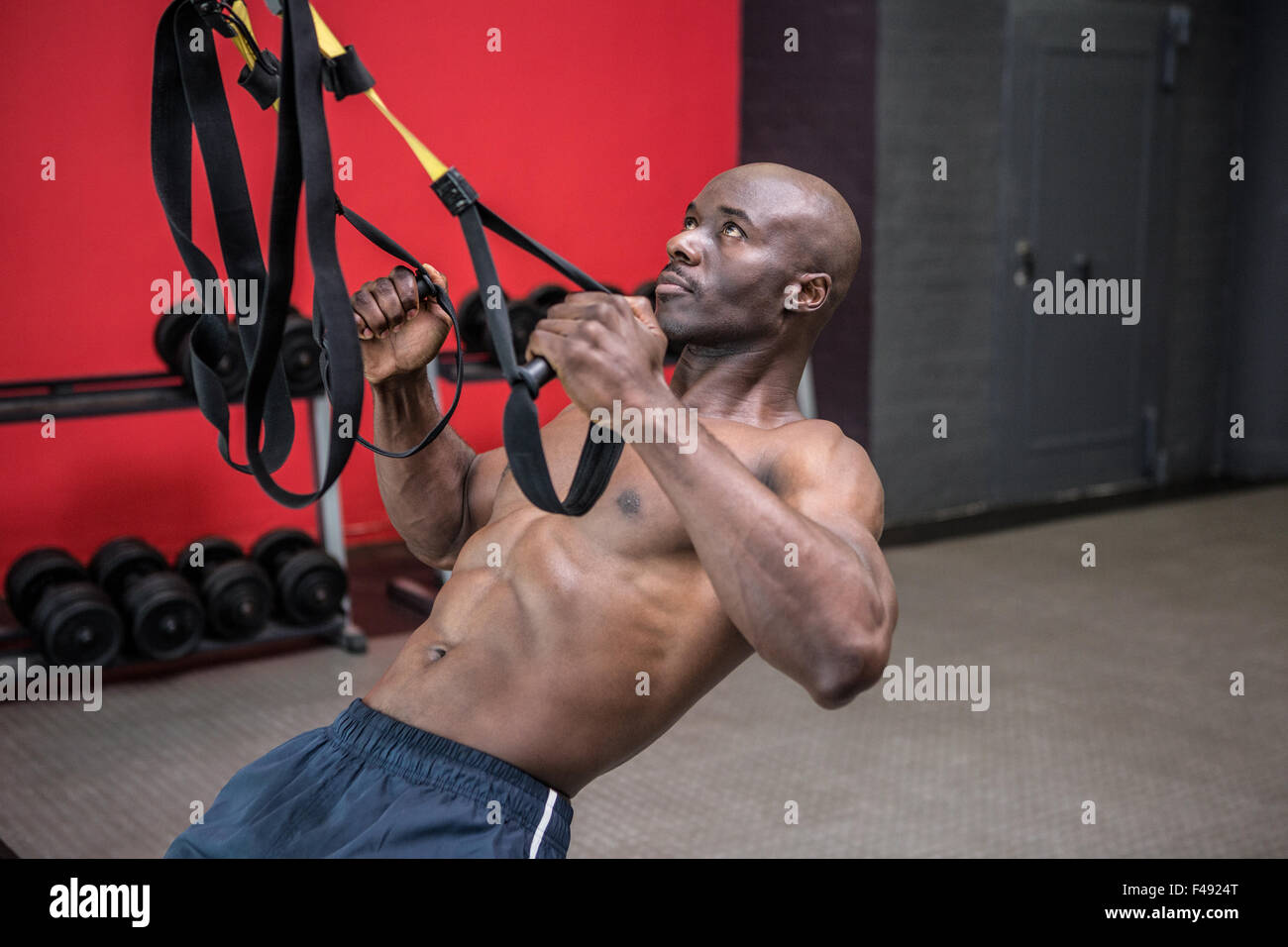 Young bodybuilder doing excercises Stock Photo - Alamy