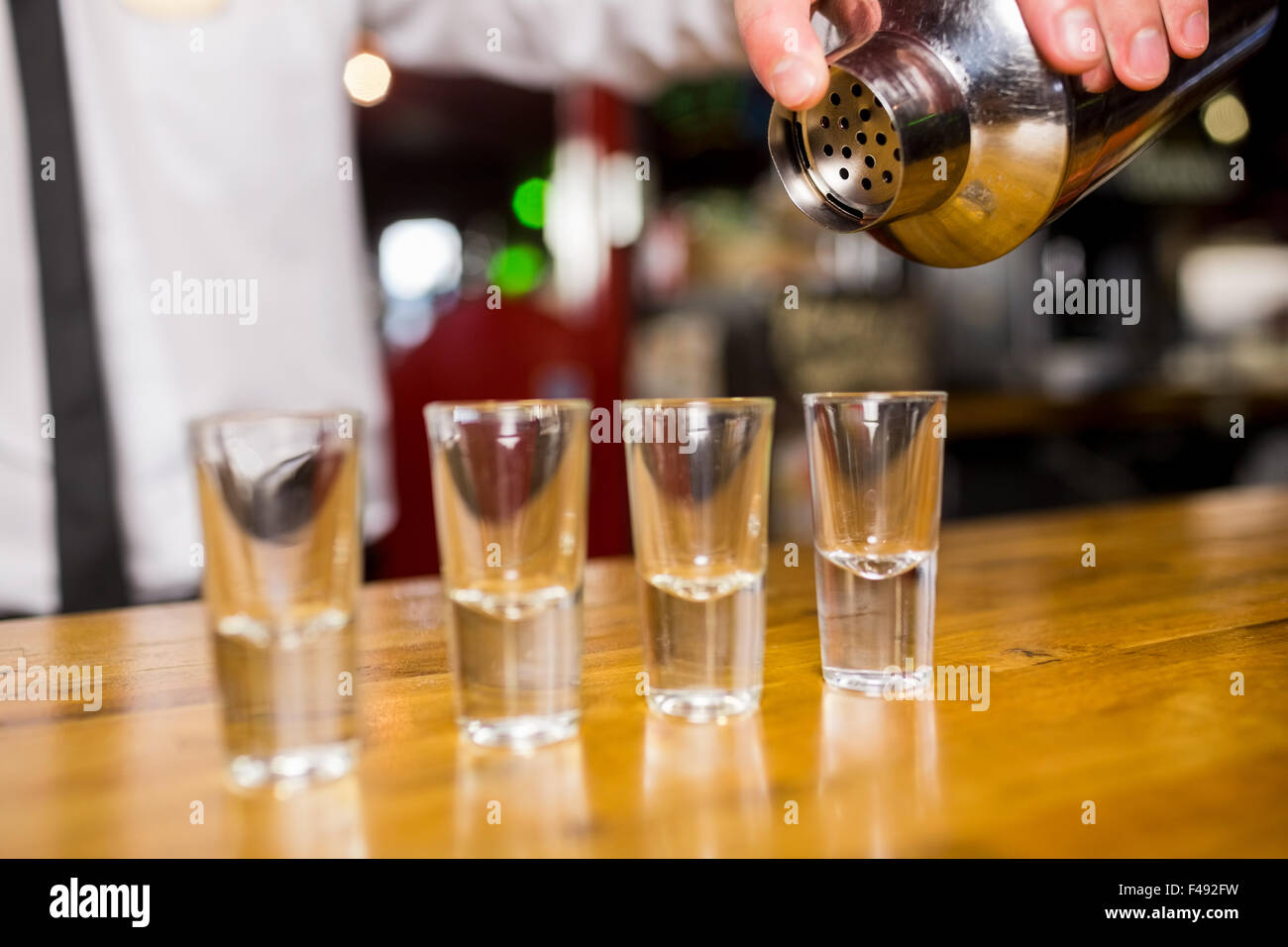 Bartender pouring cocktail hi-res stock photography and images - Alamy