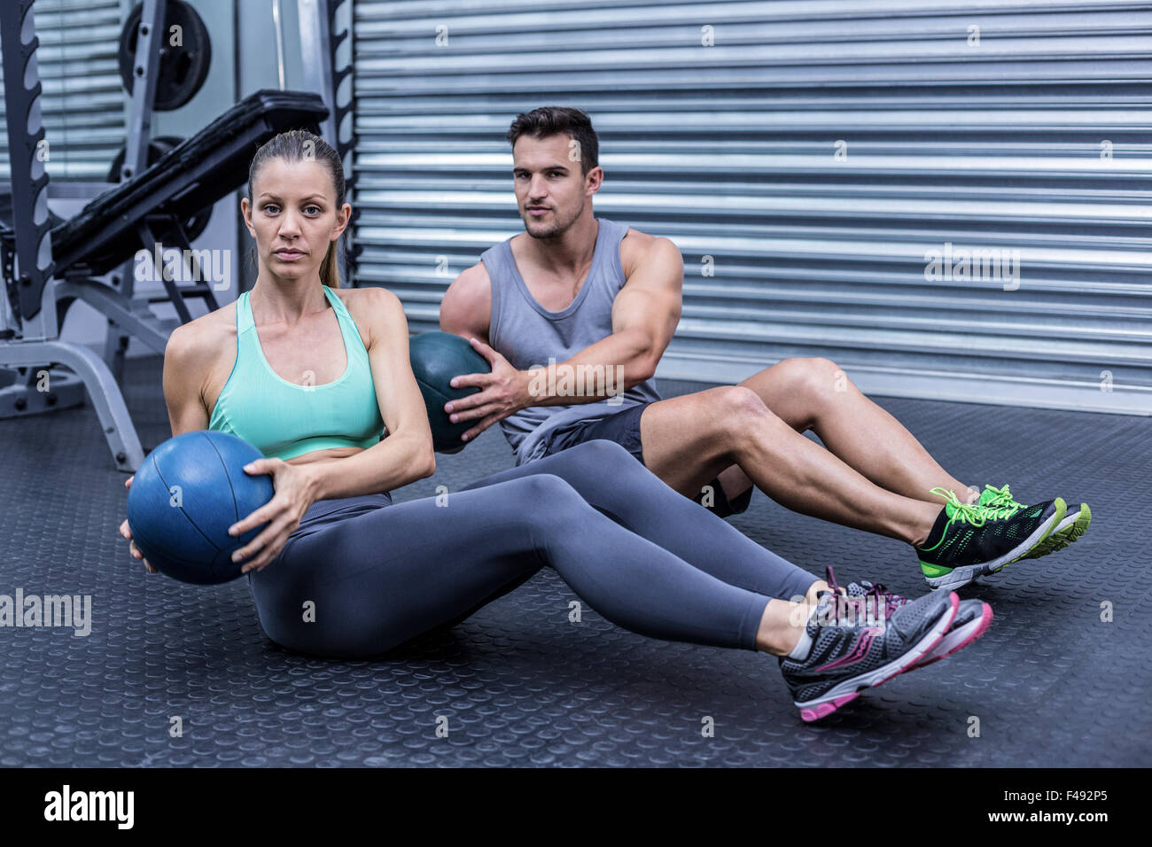 Muscular couple doing ball hi-res stock photography and images - Alamy