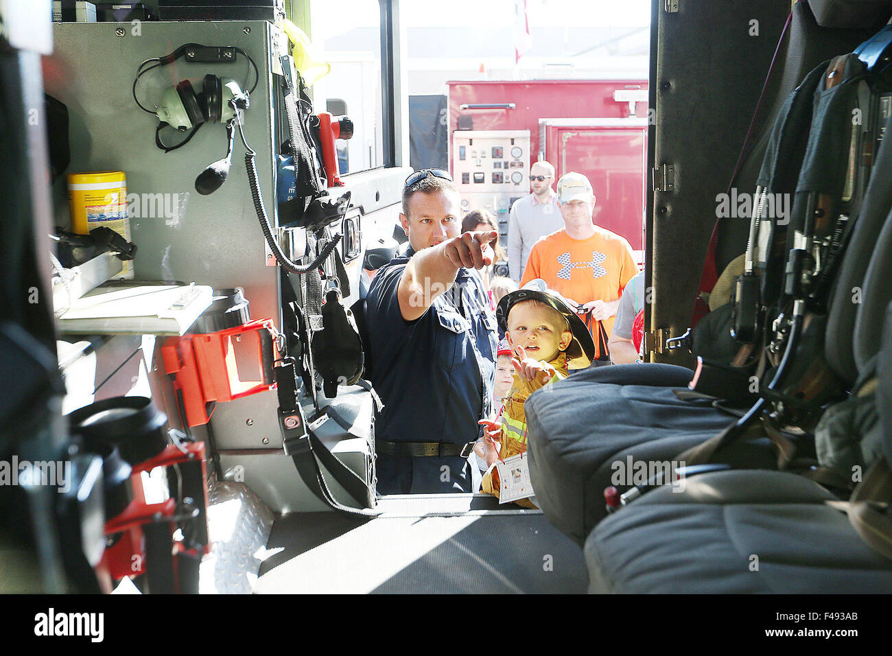 Firefighter inside fire station hi-res stock photography and images - Alamy