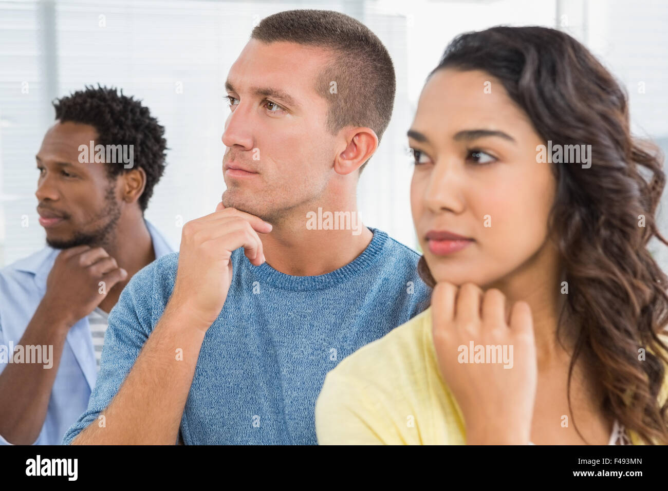 Portrait of focused colleagues Stock Photo - Alamy