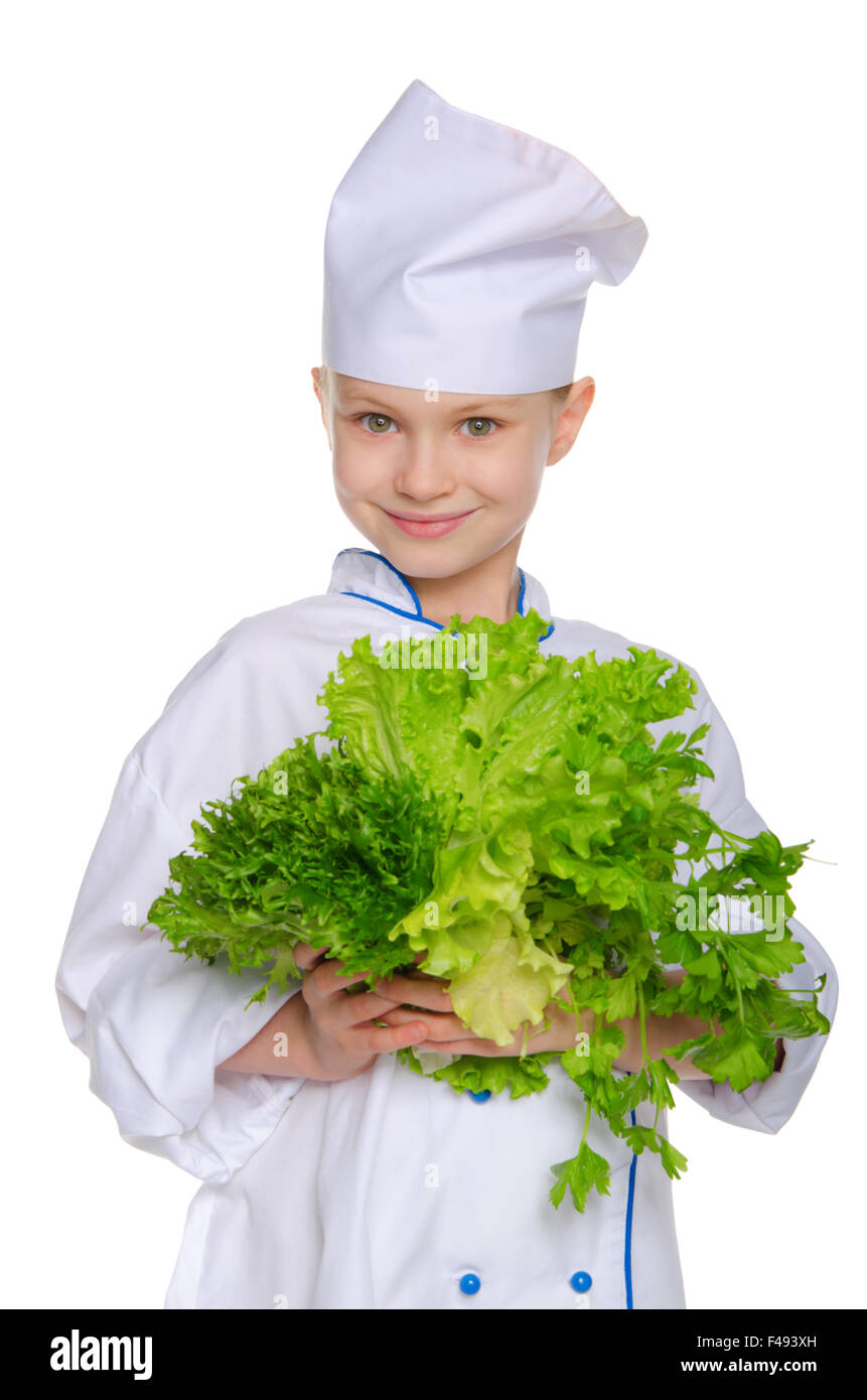 Smiling cook with fresh herbs Stock Photo - Alamy