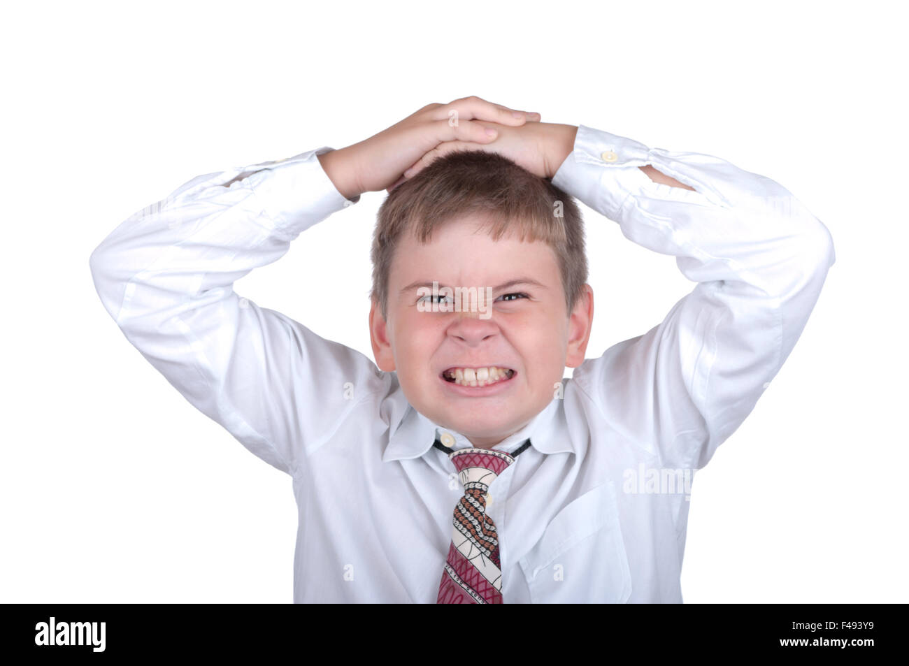 The boy is angry has put hands on a head Stock Photo - Alamy