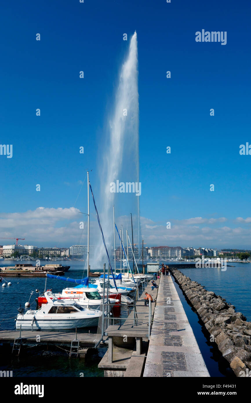 Boats on lake geneva switzerland with jet deau fountain geneva hi-res ...
