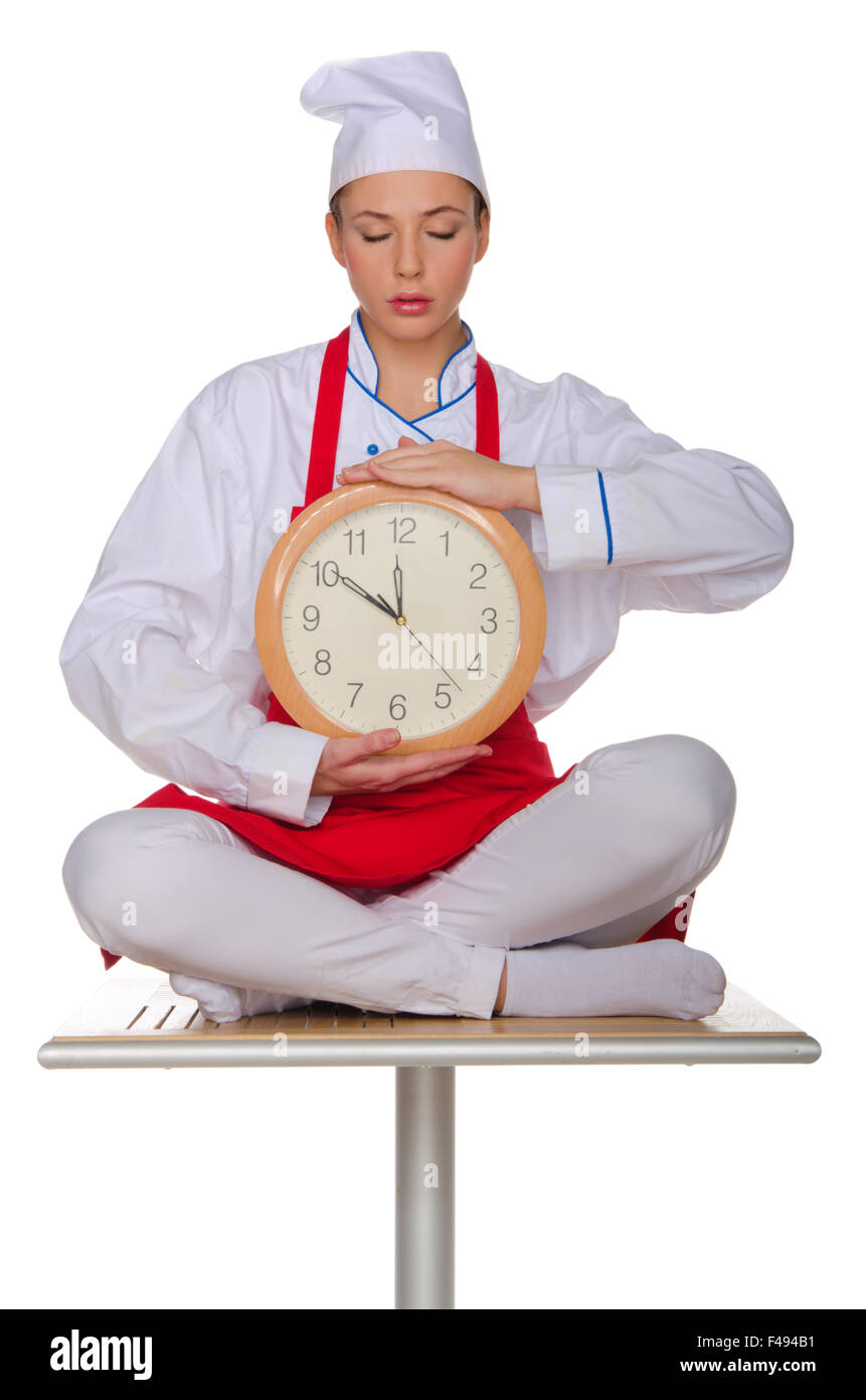 Cook meditates with clock Stock Photo - Alamy