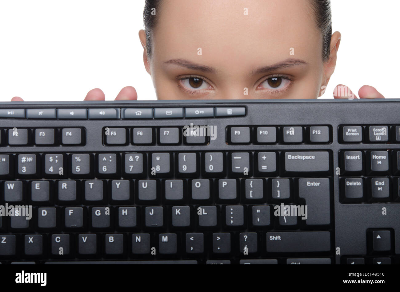 Young lady holding a keyboard Stock Photo - Alamy