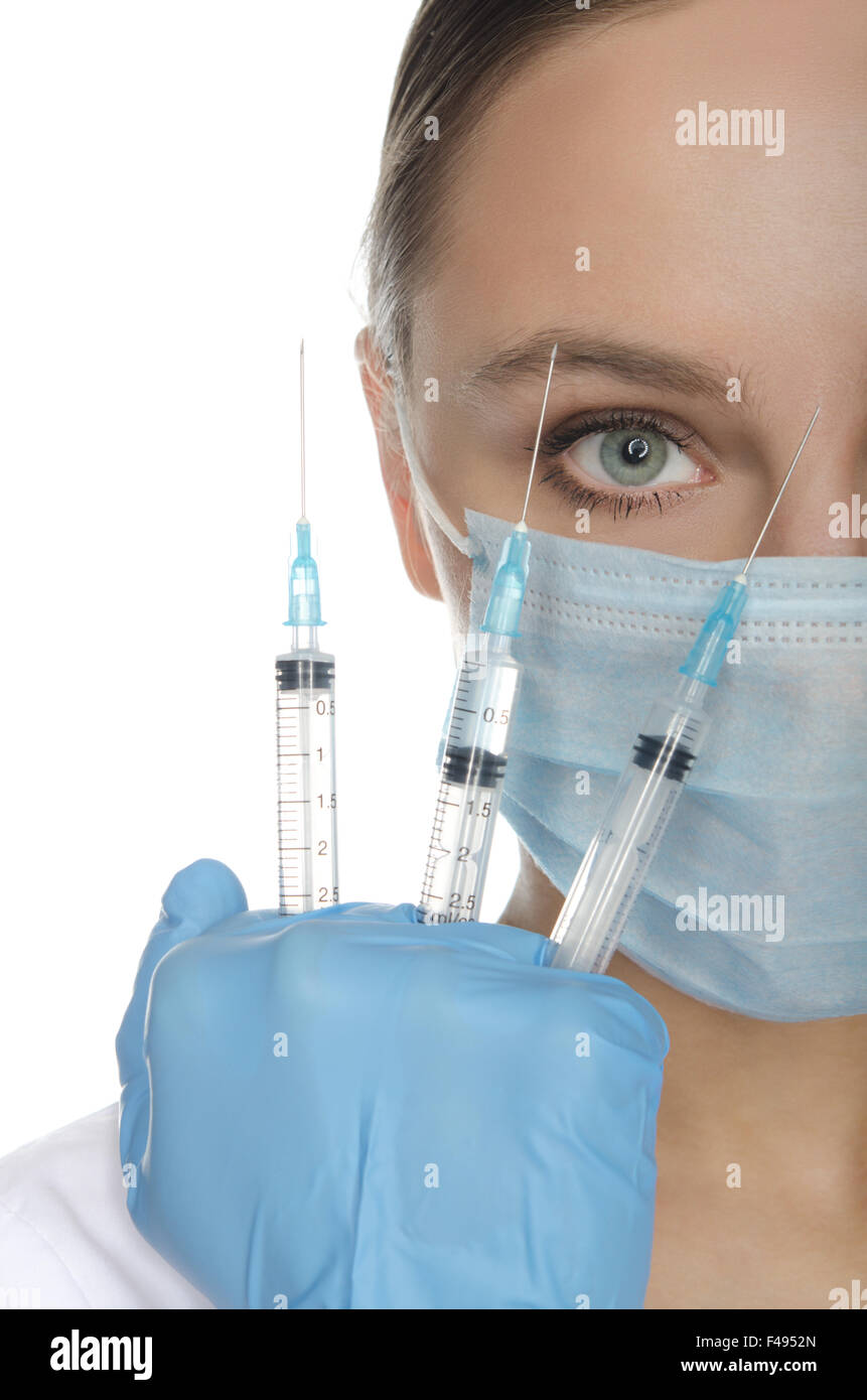 Nurse holding three syringe Stock Photo - Alamy