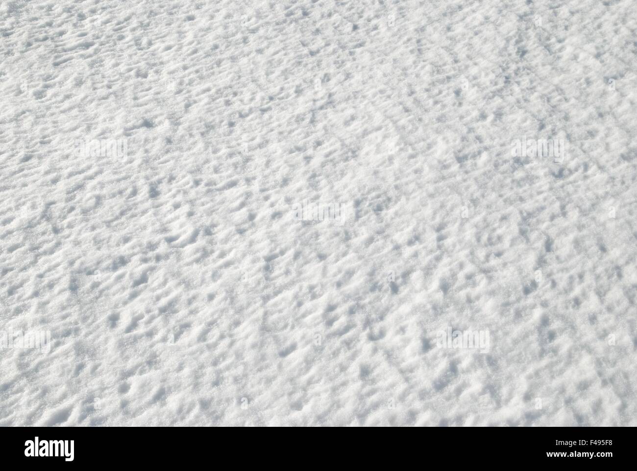 Texture of white snow Stock Photo - Alamy