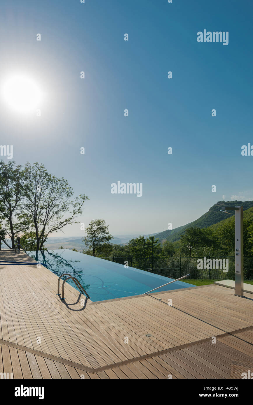 Infinity pool on the bright summer day Stock Photo - Alamy