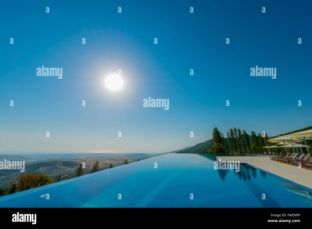 Infinity pool on the bright summer day Stock Photo - Alamy