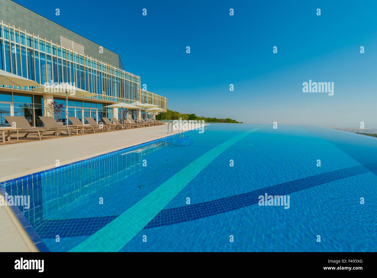Infinity pool on the bright summer day Stock Photo - Alamy
