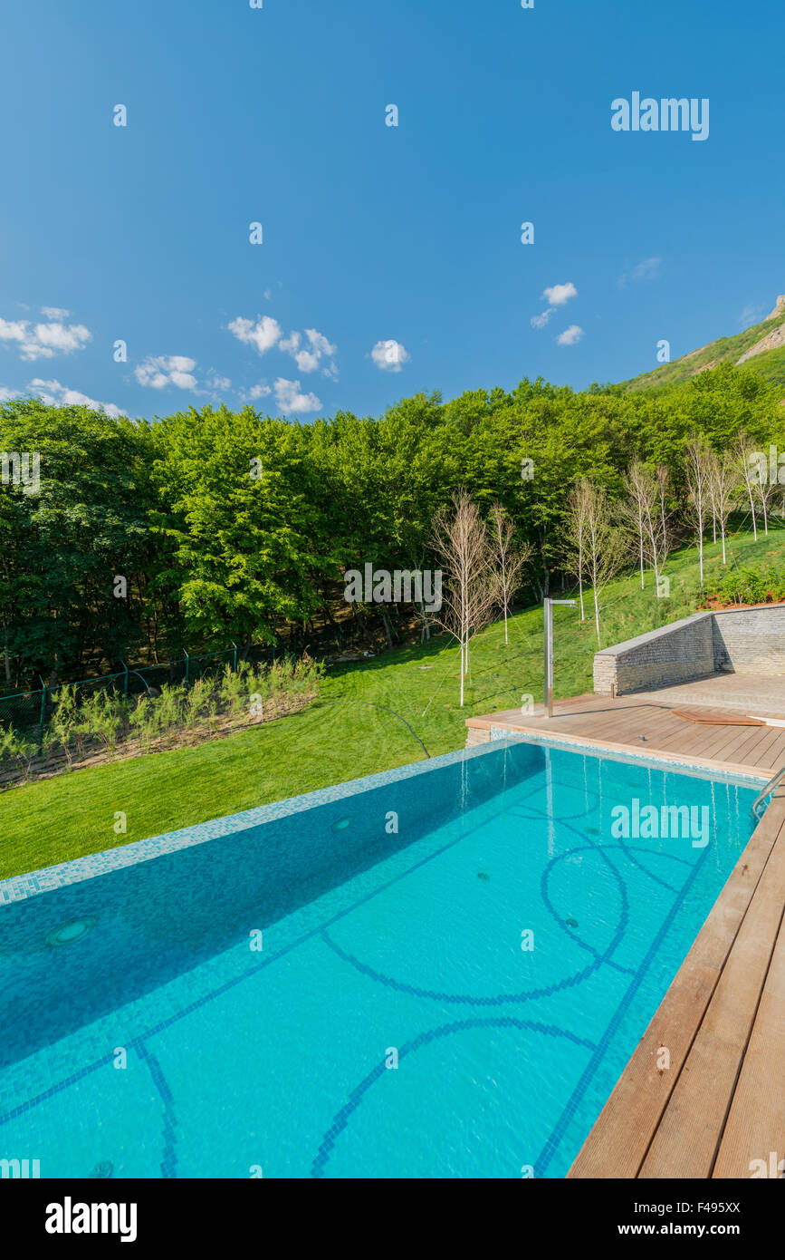 Infinity pool on the bright summer day Stock Photo - Alamy