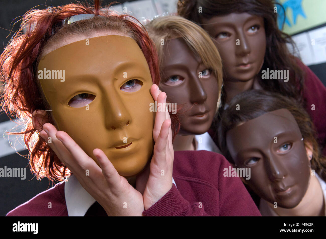 Hanham High School drama class,with girls wearing masks and lying in ...
